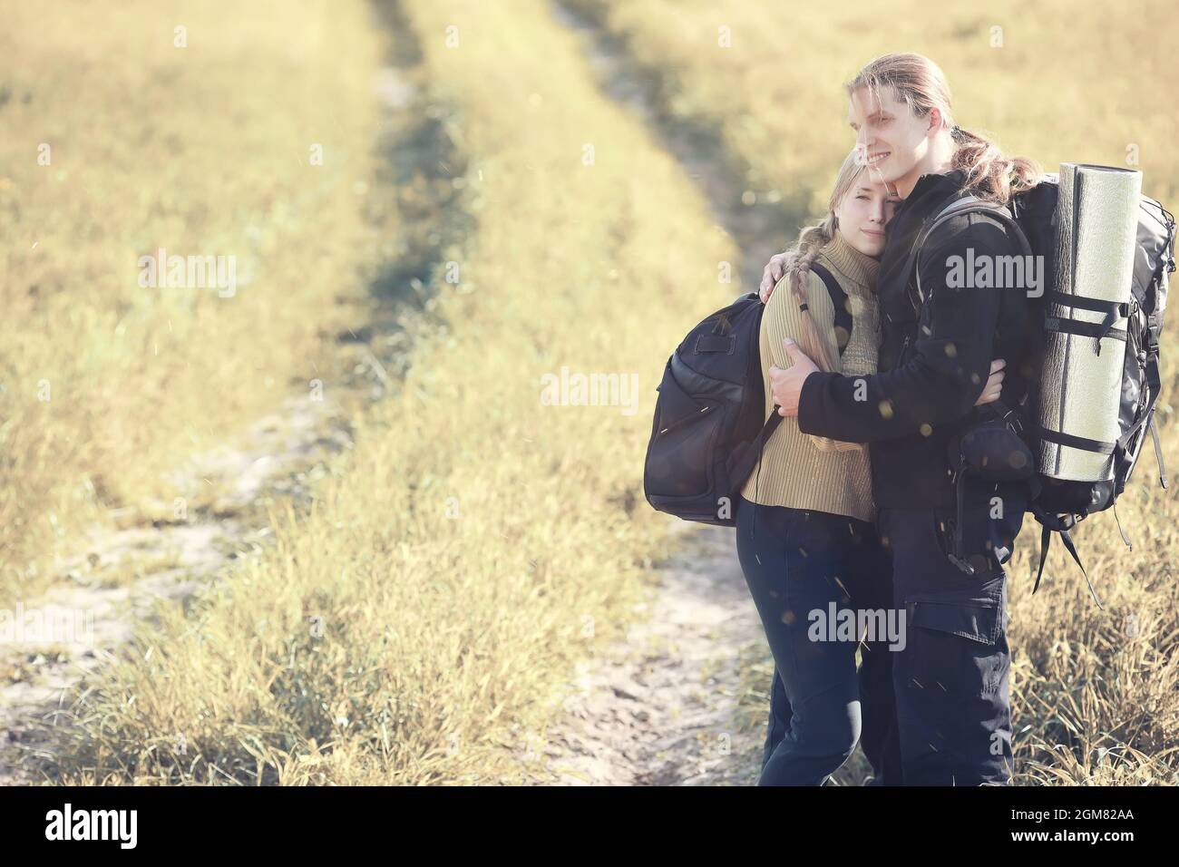 Traveling with a backpack on foot and hitchhiking Stock Photo - Alamy