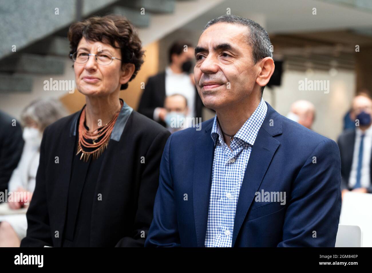Cologne, Germany. 17th Sep, 2021. Ugur Sahin (r) and Özlem Türeci sit ...