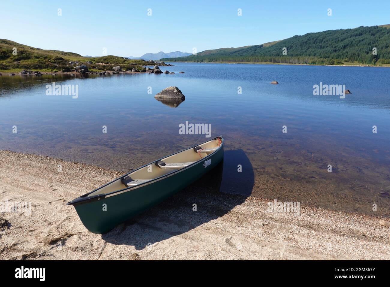 Canadian canoe on beach at Loch Laidon, Scottish Highlands, Scotland ...