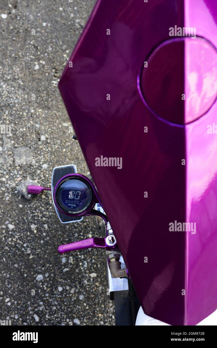 Closeup of a stylish glossy purple bike Stock Photo - Alamy