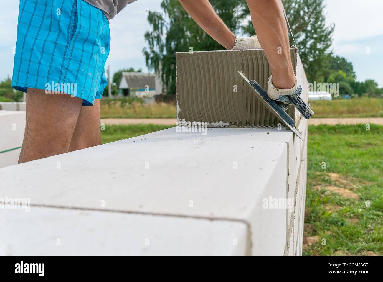 Man building up house building blocks hi-res stock photography and ...
