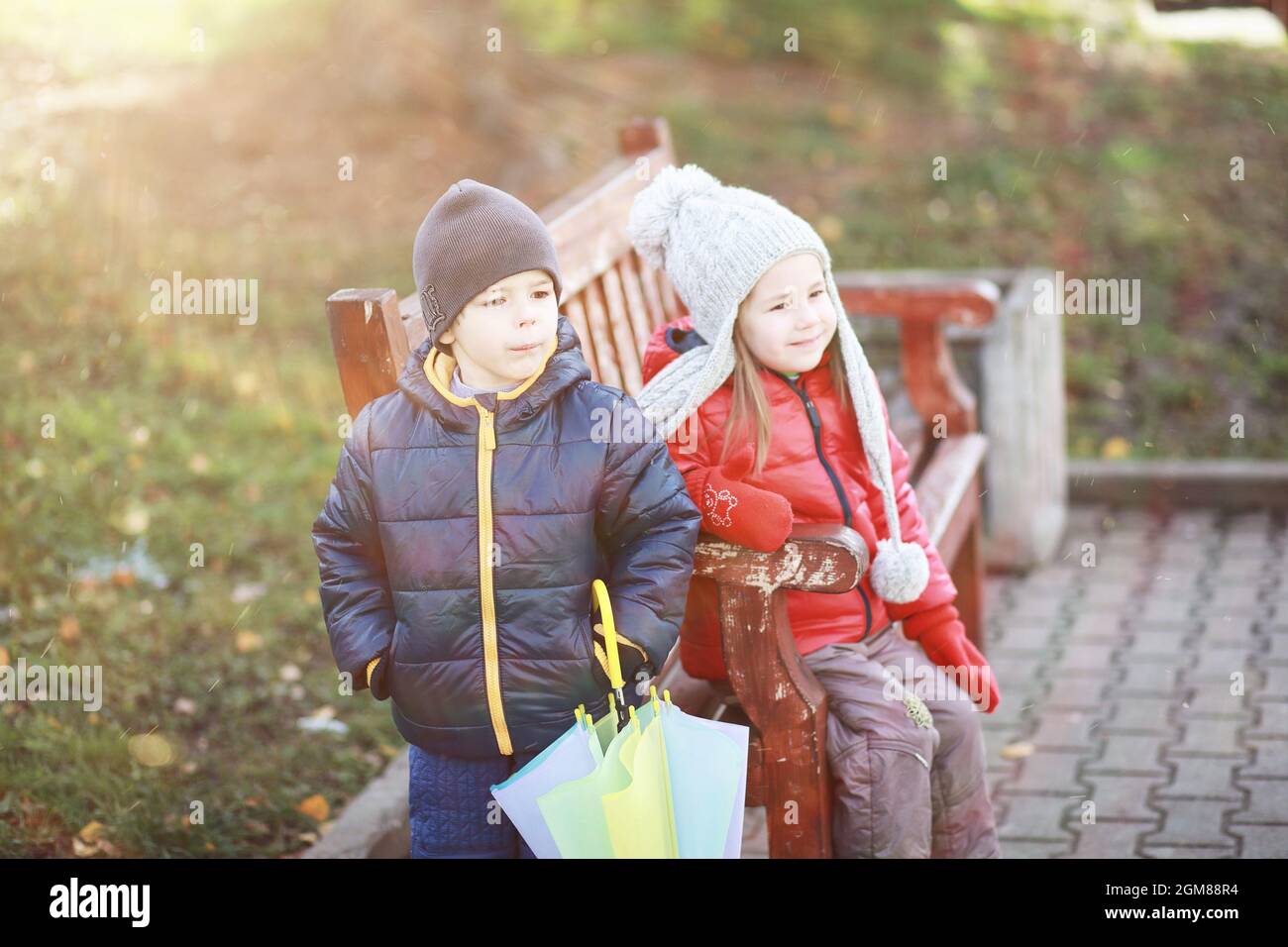 Children walk in the autumn park in the fall Stock Photo - Alamy