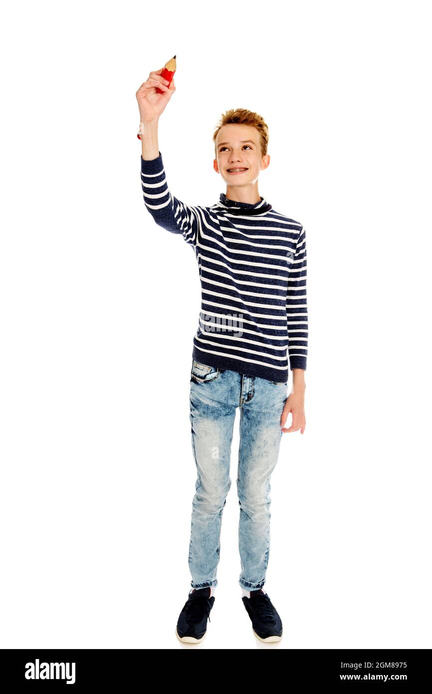 Standing young fashion model boy with the white background Stock Photo ...