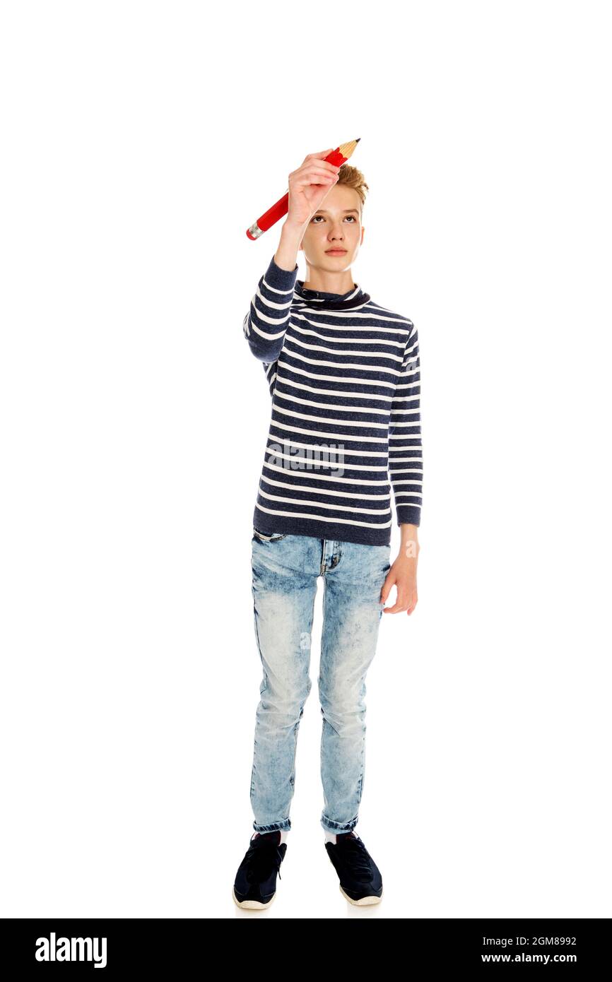 Standing young fashion model boy with the white background Stock Photo ...