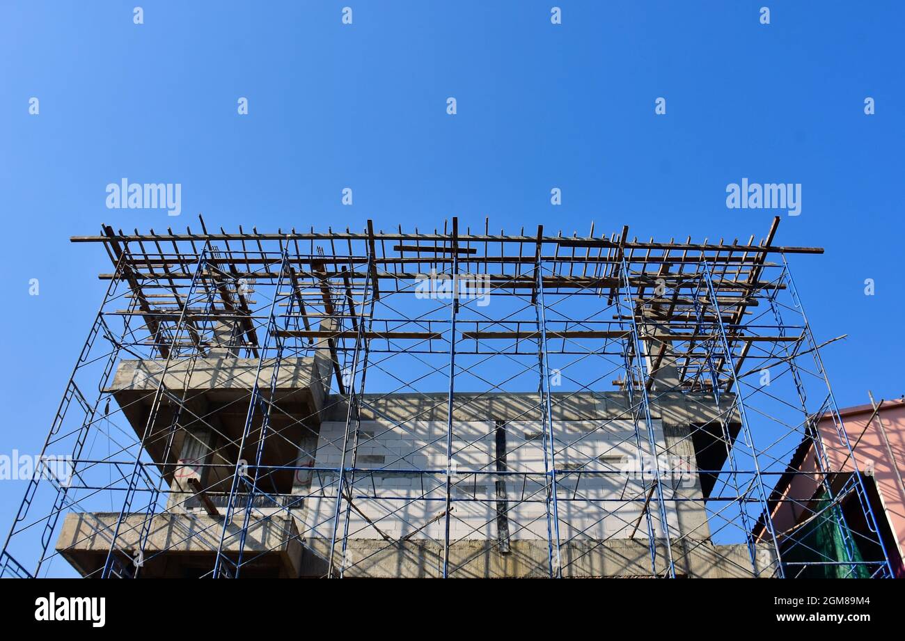 Scaffolding on a building under construction Stock Photo - Alamy