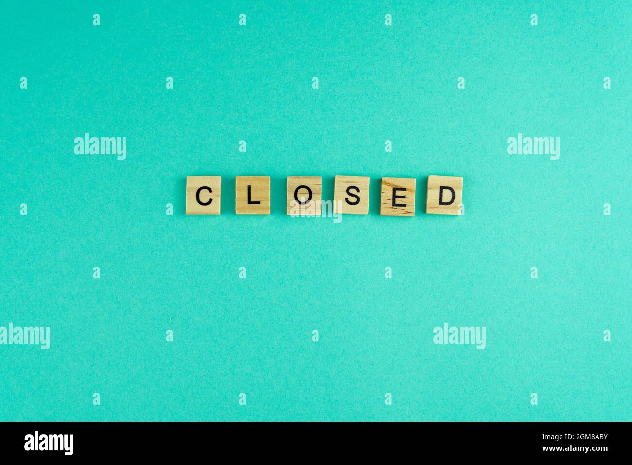 Word closed. The phrase is laid out in wooden letters. Top view ...