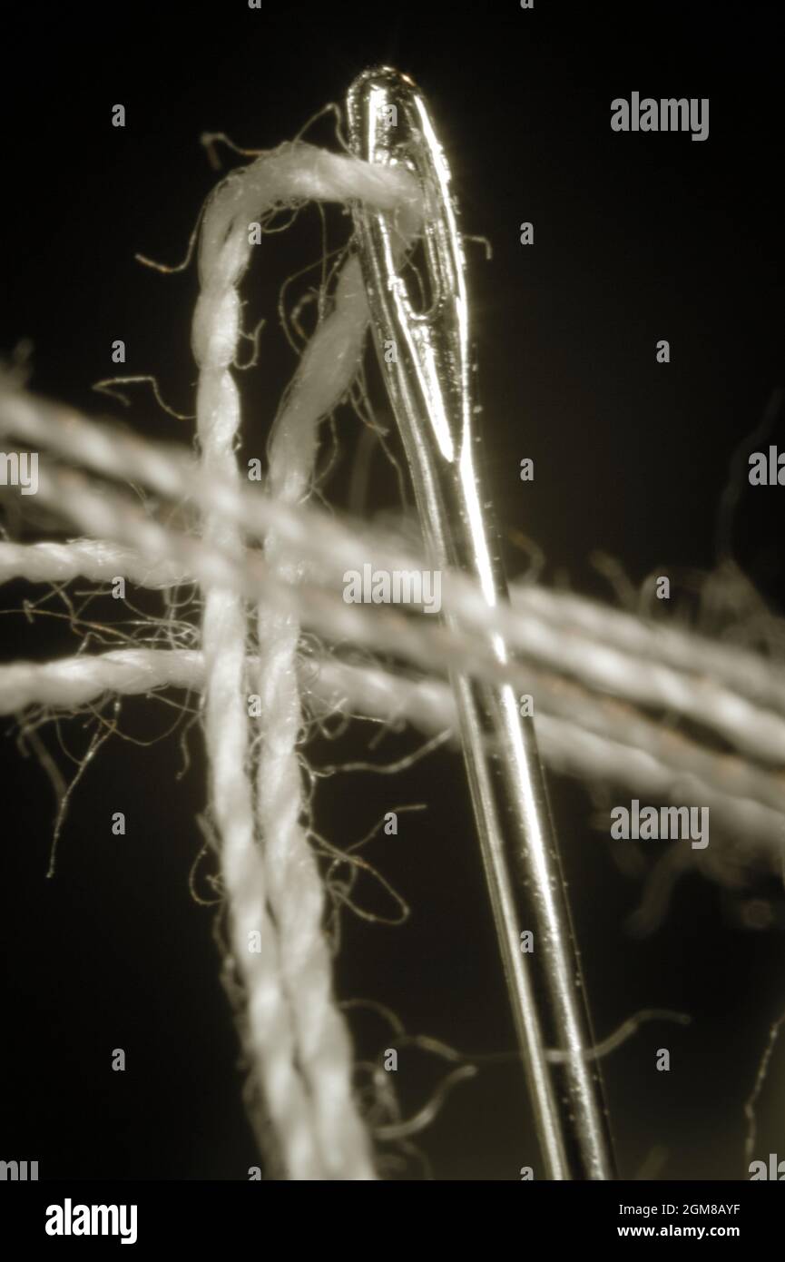 Thread in needle sewing hi-res stock photography and images - Alamy