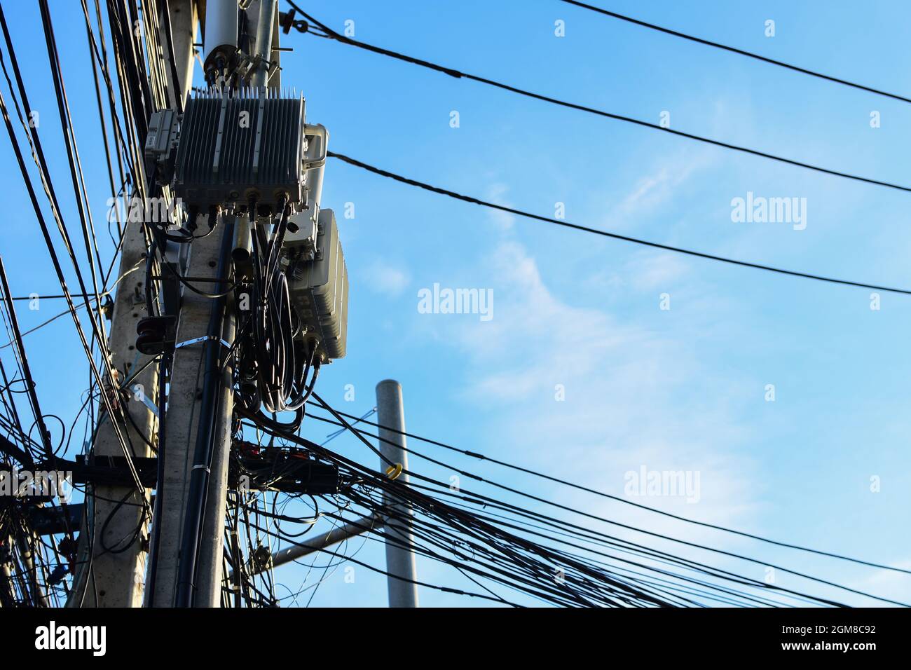 Cable clutter located on power poles Stock Photo - Alamy
