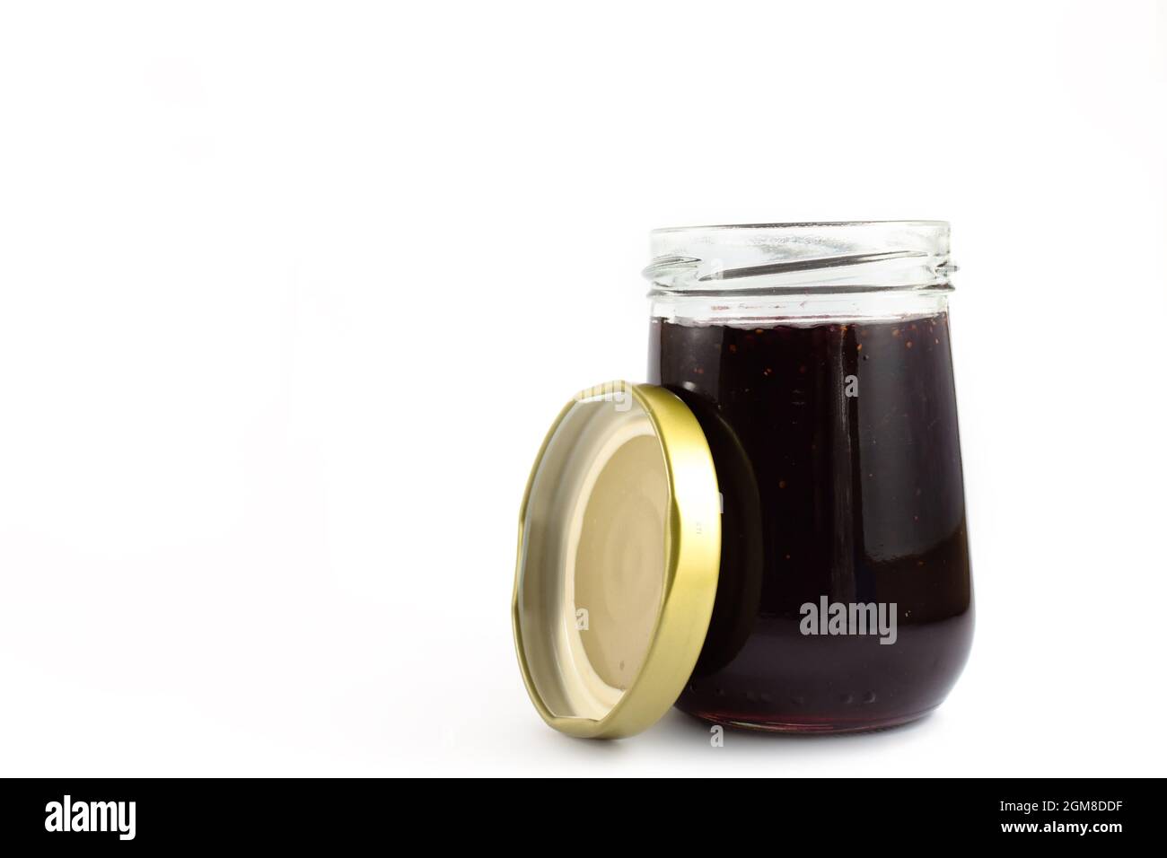 Grape jam isolated on white background Stock Photo - Alamy