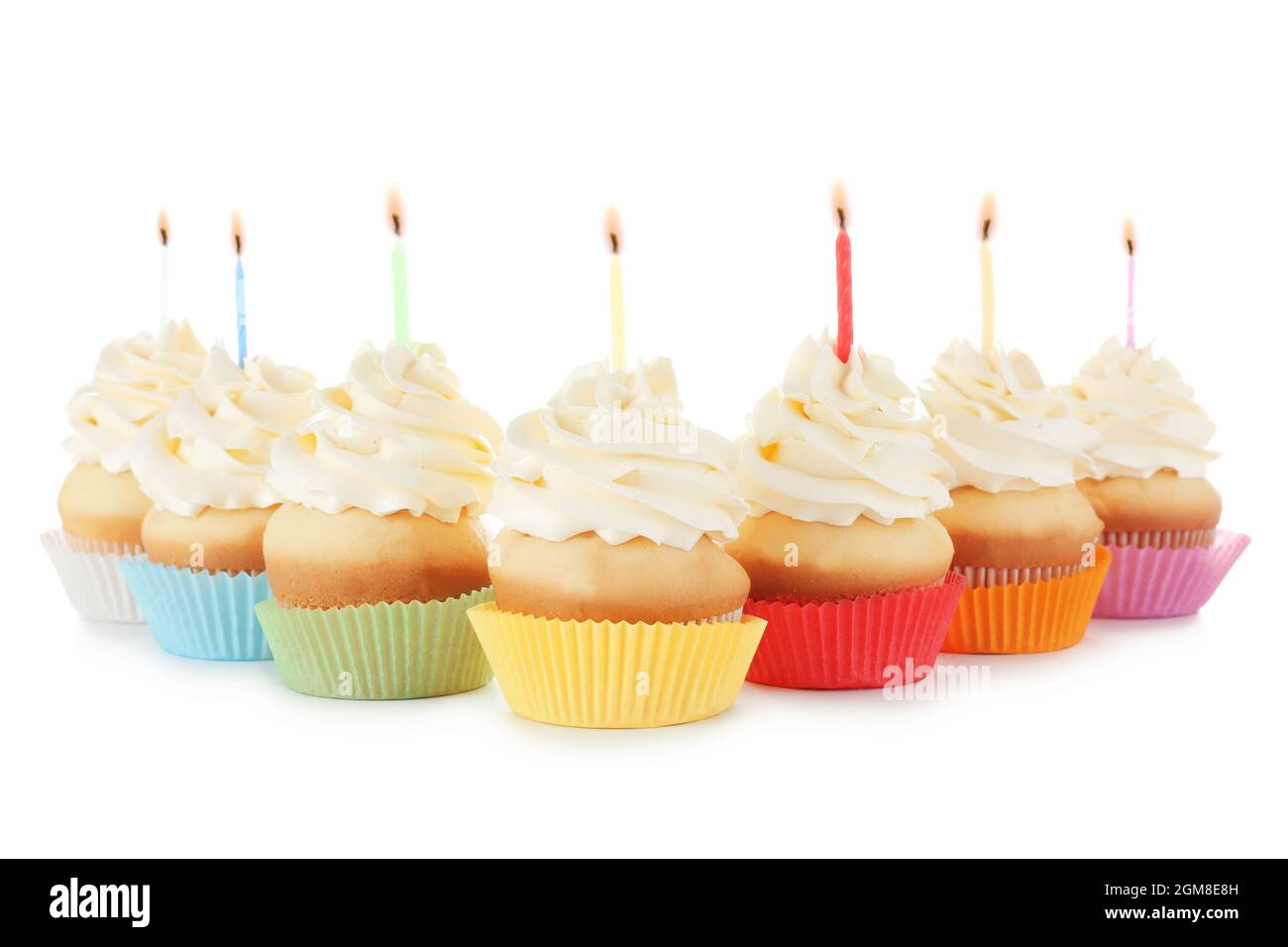 Birthday cupcakes with candles Cut Out Stock Images & Pictures - Alamy