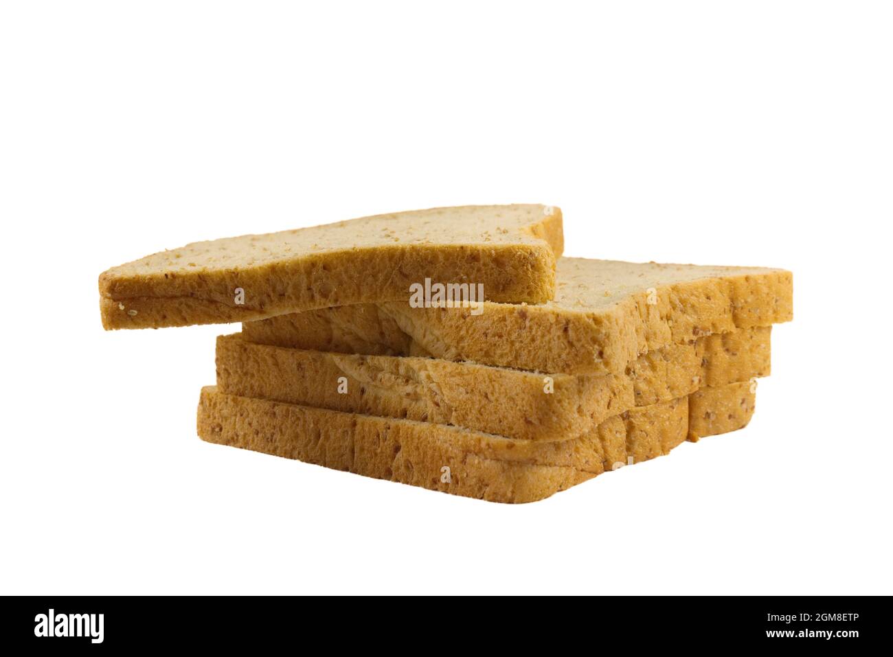 Whole wheat bread stack on isolated white background Stock Photo - Alamy