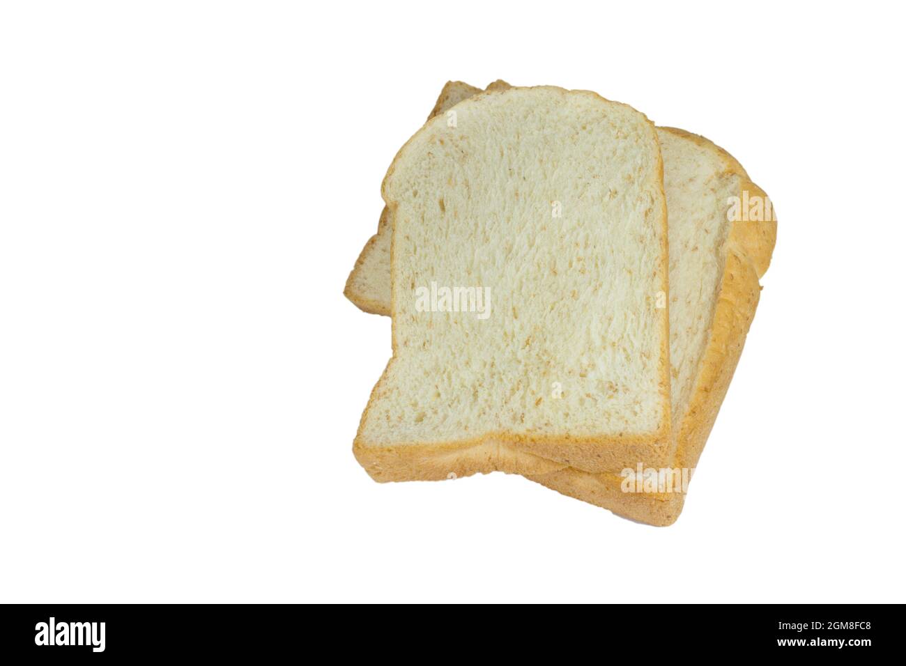 Whole wheat bread stack on isolated white background Stock Photo - Alamy