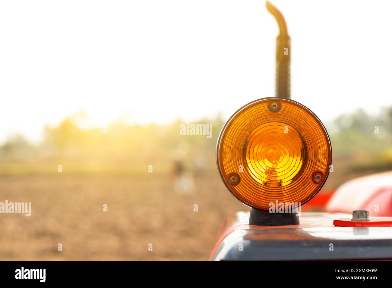 Turn Signal for Tractor on field backround Stock Photo - Alamy