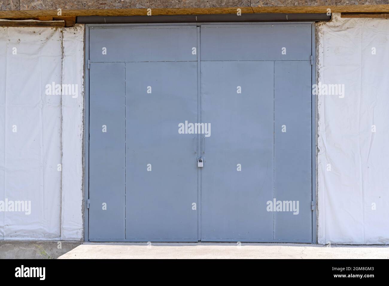 Closed and Locked Storage Door at Warehouse Building Stock Photo - Alamy