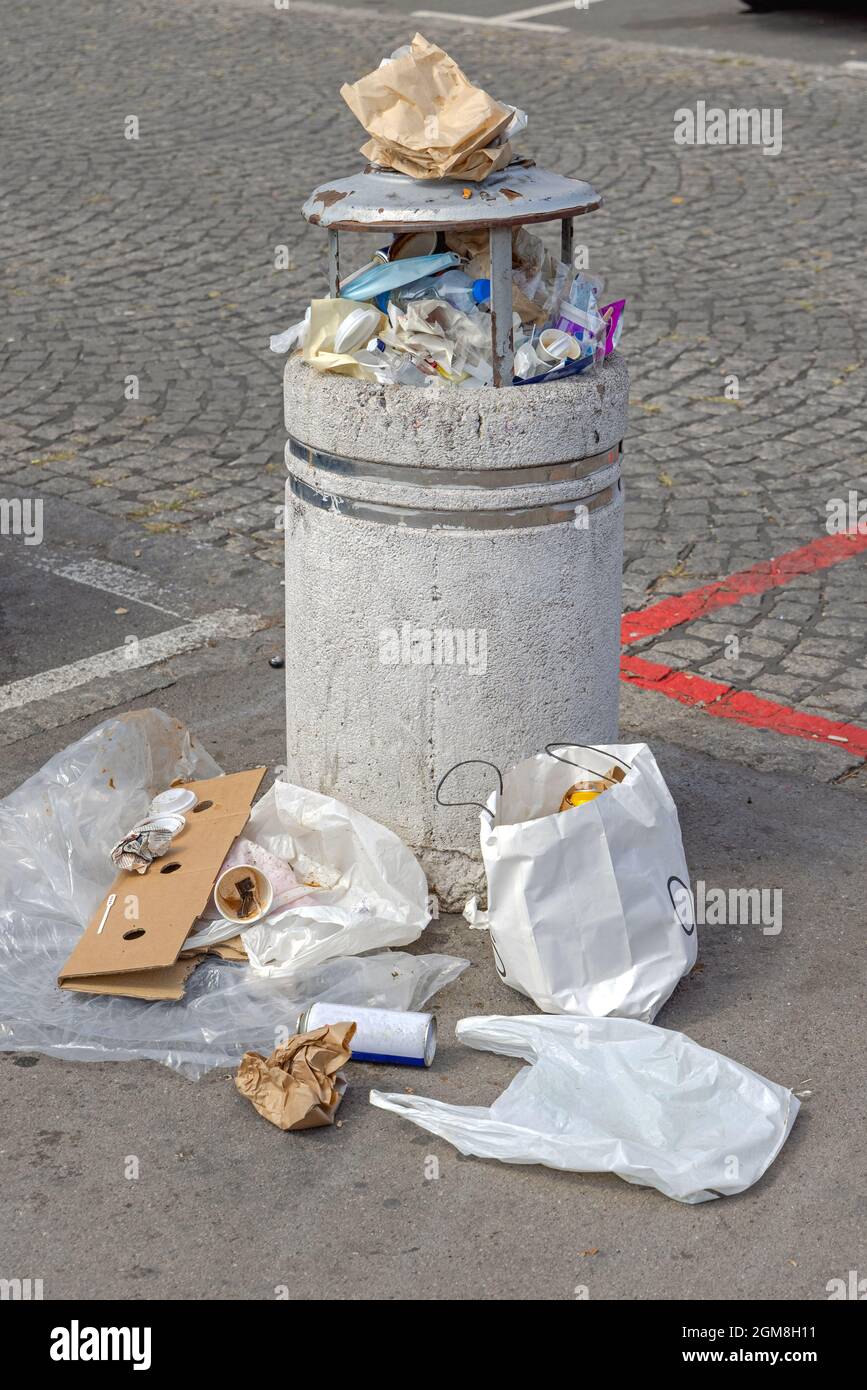 Overloaded Litter Bin at Street City Garbage Problem Stock Photo - Alamy