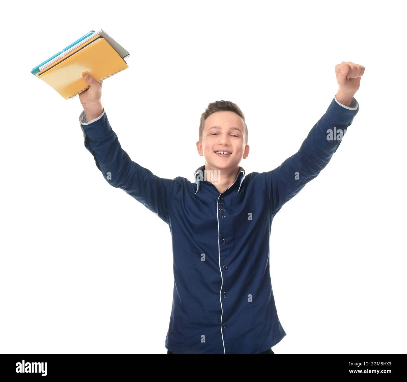Teenage boy with notebooks on white background Stock Photo - Alamy