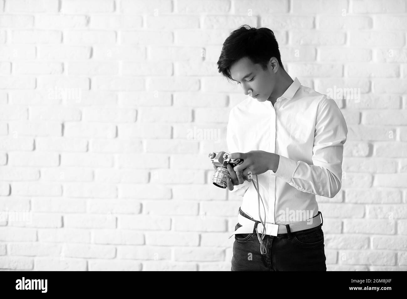 Japanese tourist camera Black and White Stock Photos & Images - Alamy