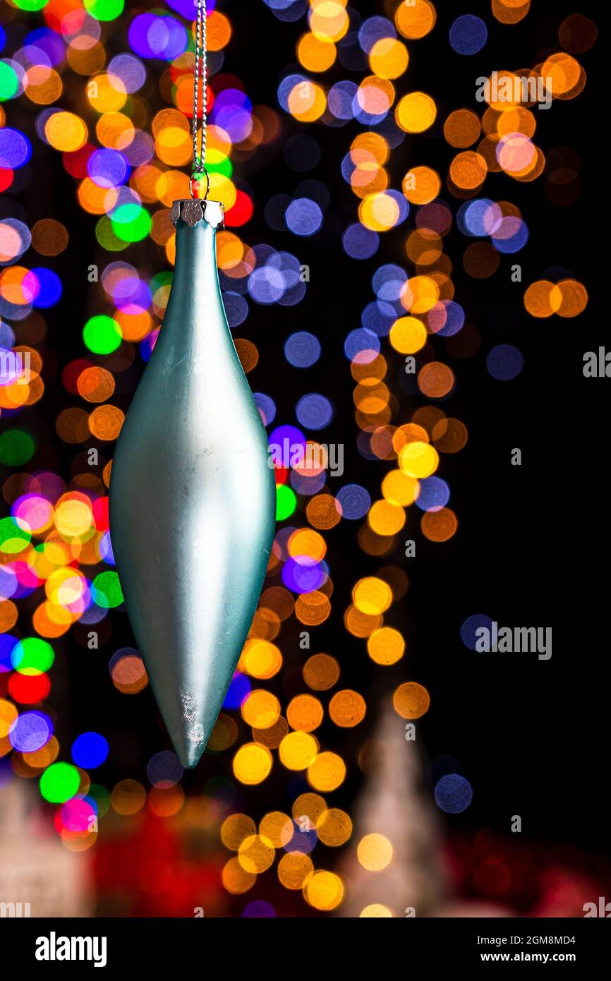 Vertical closeup of the Christmas ornament against bokeh lights background Stock Photo - Alamy