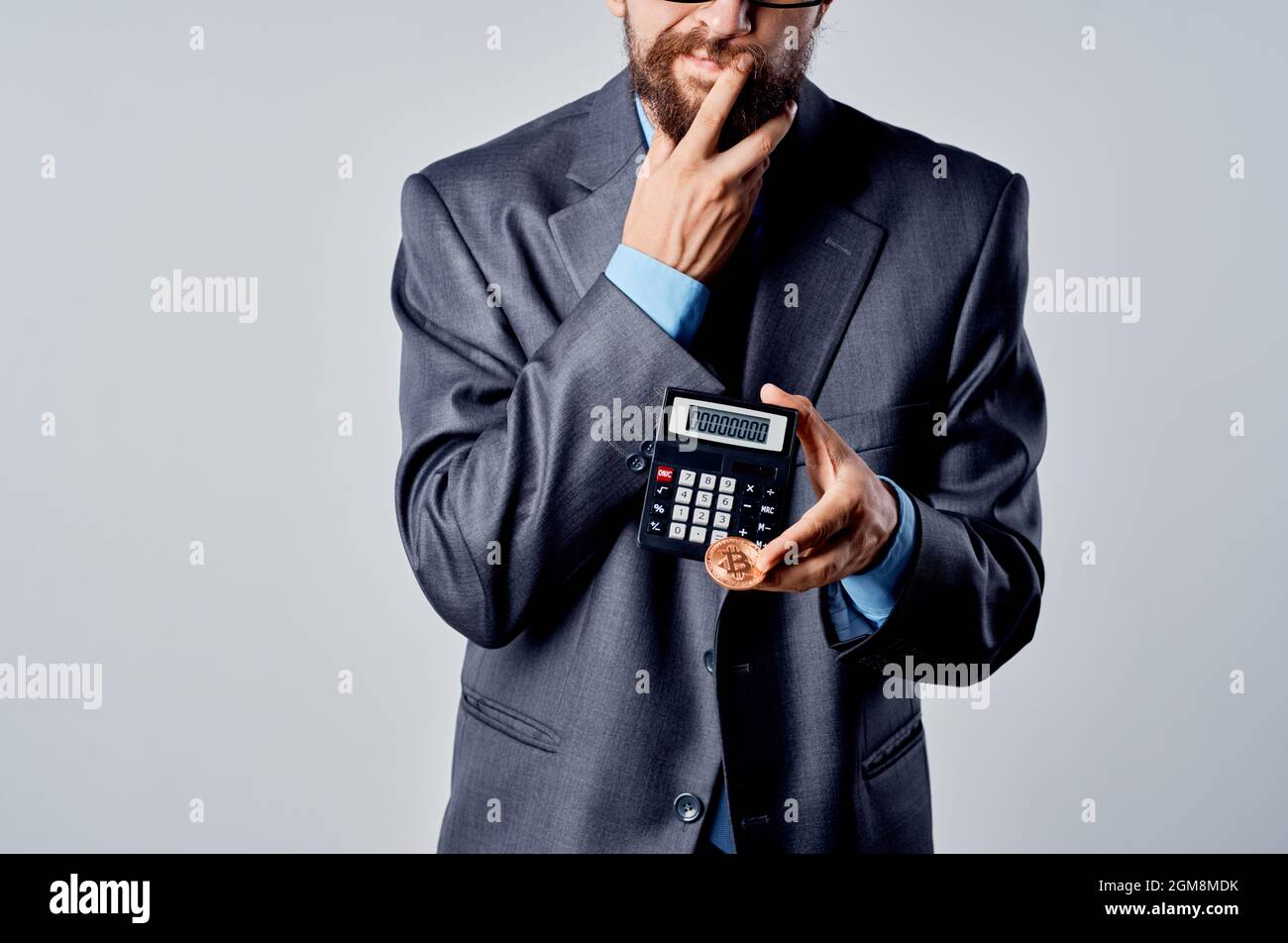 bearded man calculator bitcoin in hand counting finance isolated ...