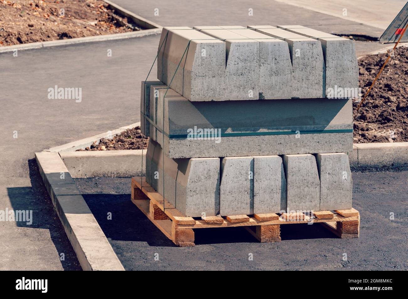 Curb stone on construction site. Pallet With A Stack Of Concrete ...