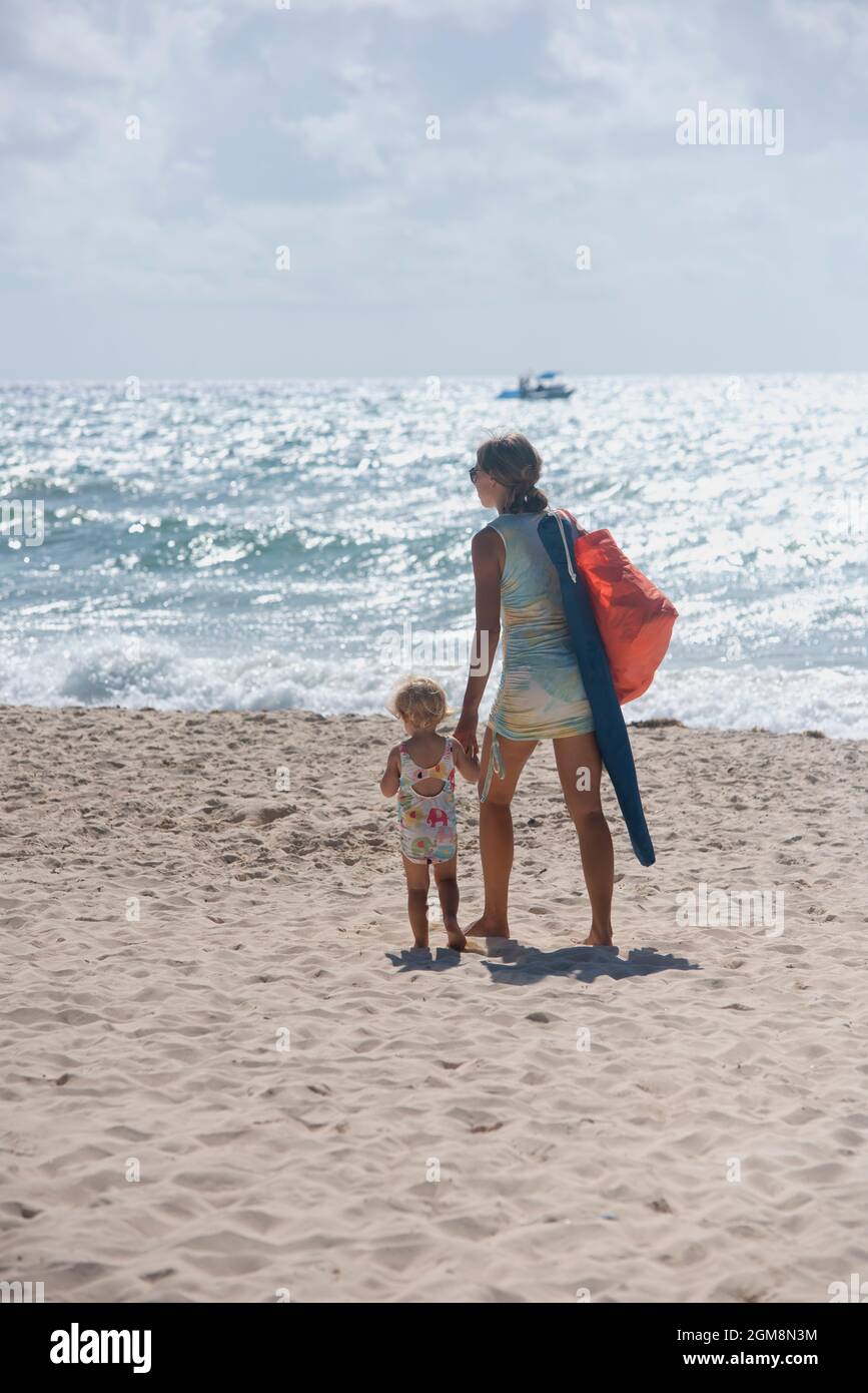 Caribbean beach young family hi-res stock photography and images - Alamy