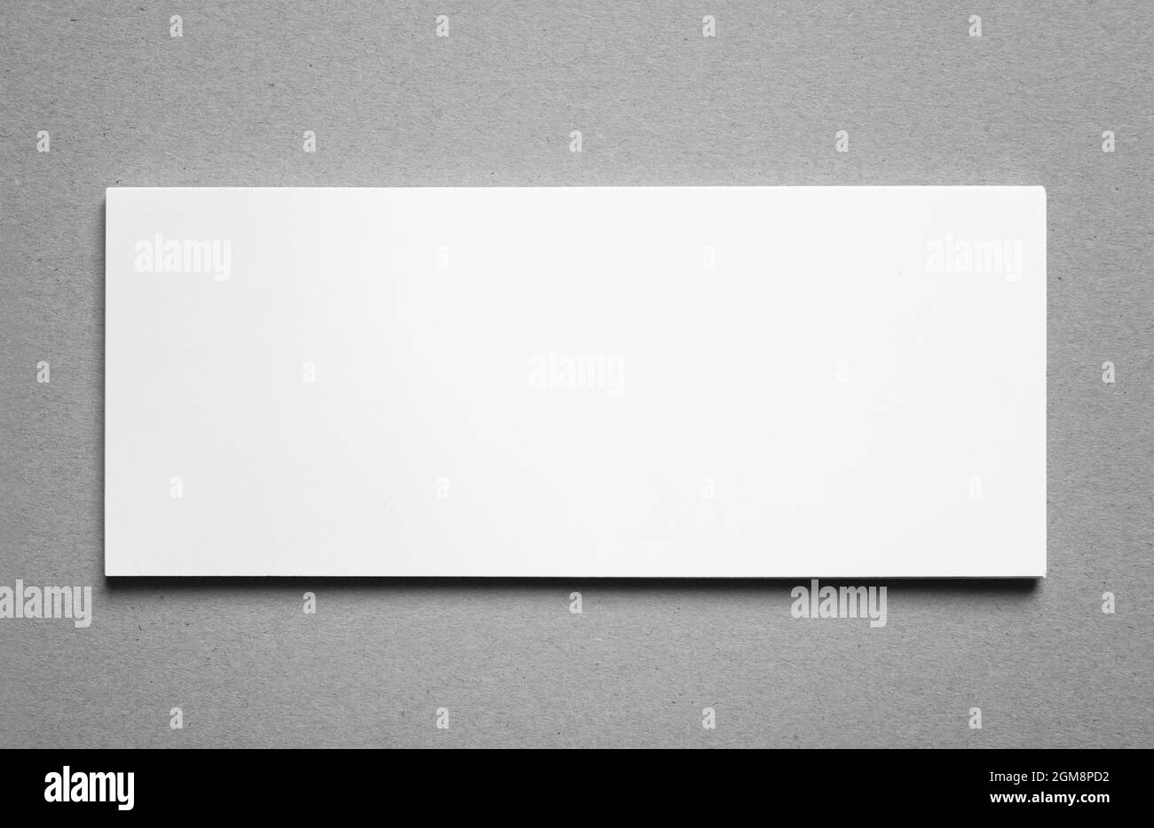 Blank card on grey background. Mock up for design Stock Photo - Alamy