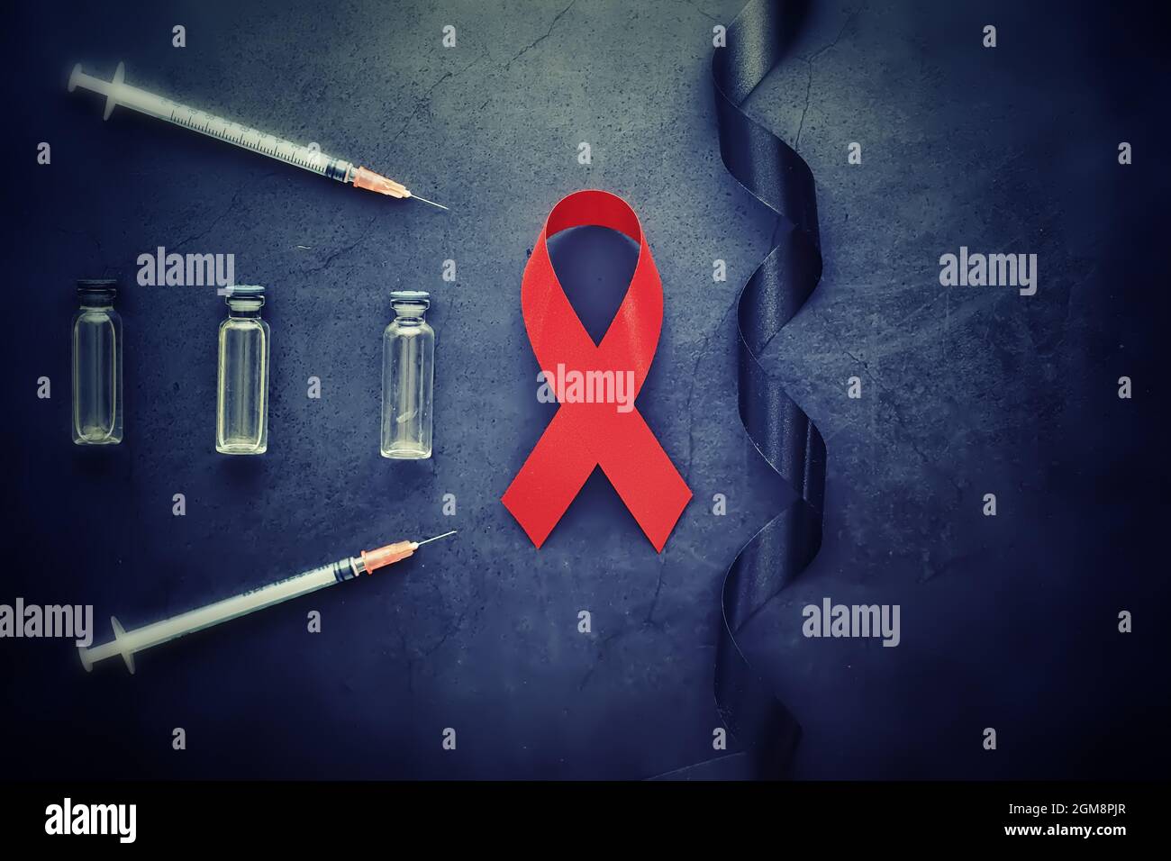 Symbol of human immunodeficiency virus disease. Red ribbon. A helping ...