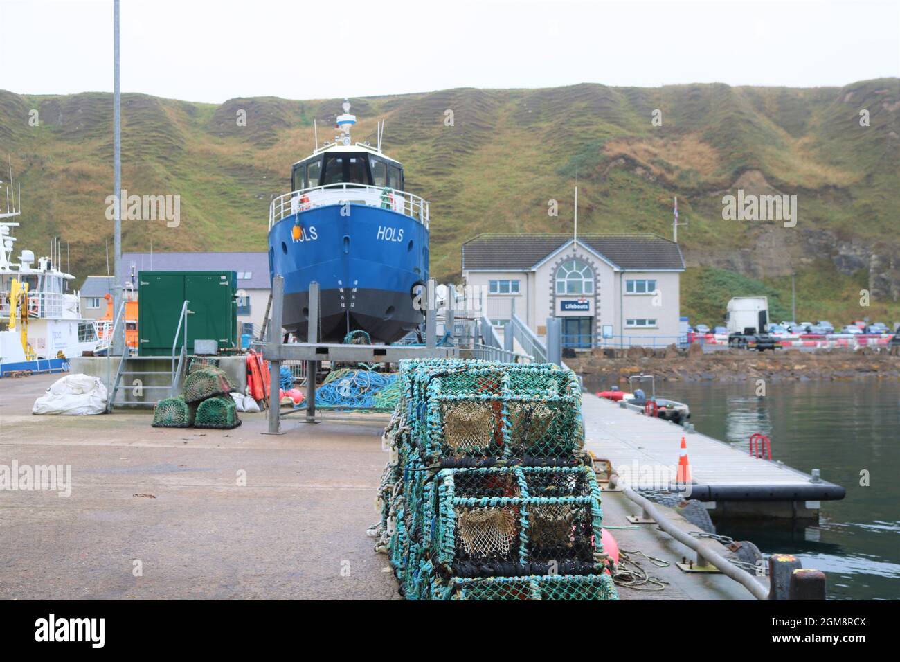 Scrabster Harbour - Boat in dry dock Stock Photo - Alamy