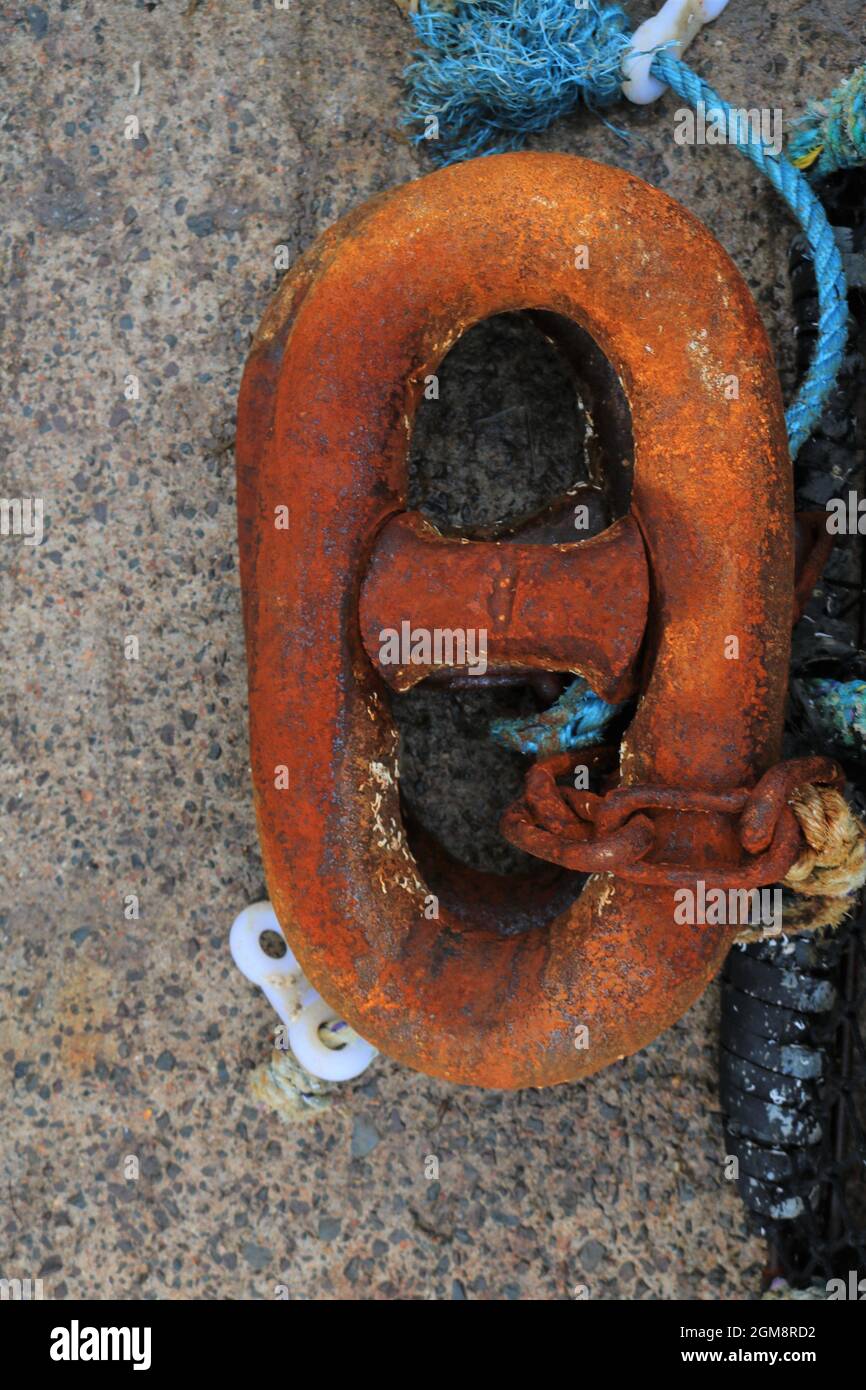 Rusty harbour mooring anchor point Stock Photo - Alamy