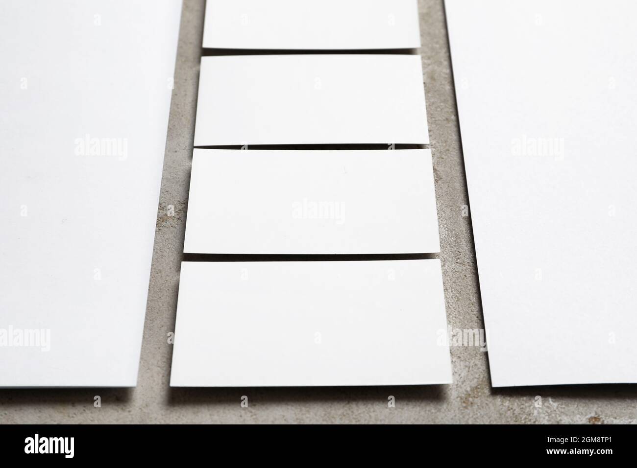 Blank cards on grey background. Mock up for design Stock Photo - Alamy