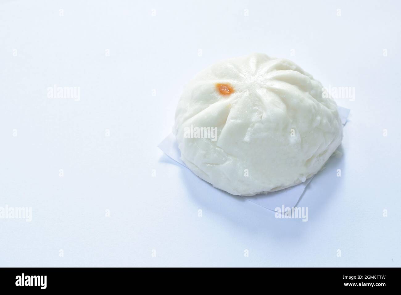 steamed bao Chinese bun stuffing mashed pork and salt egg on white ...
