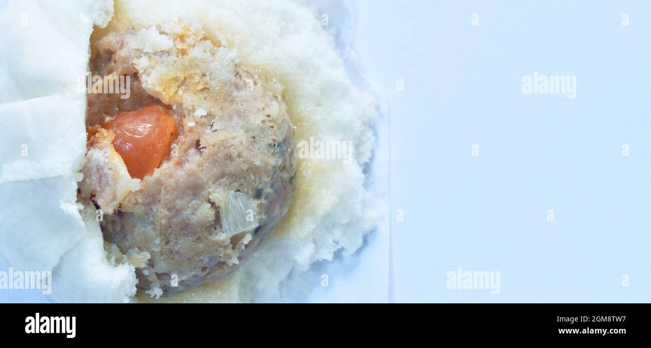 steamed bao Chinese bun stuffing mashed pork and salt egg on white ...