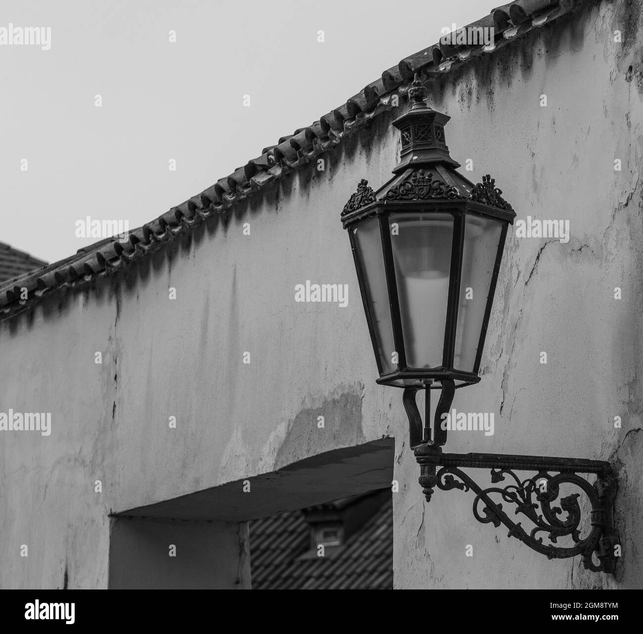 Lamp mounted Black and White Stock Photos & Images - Alamy