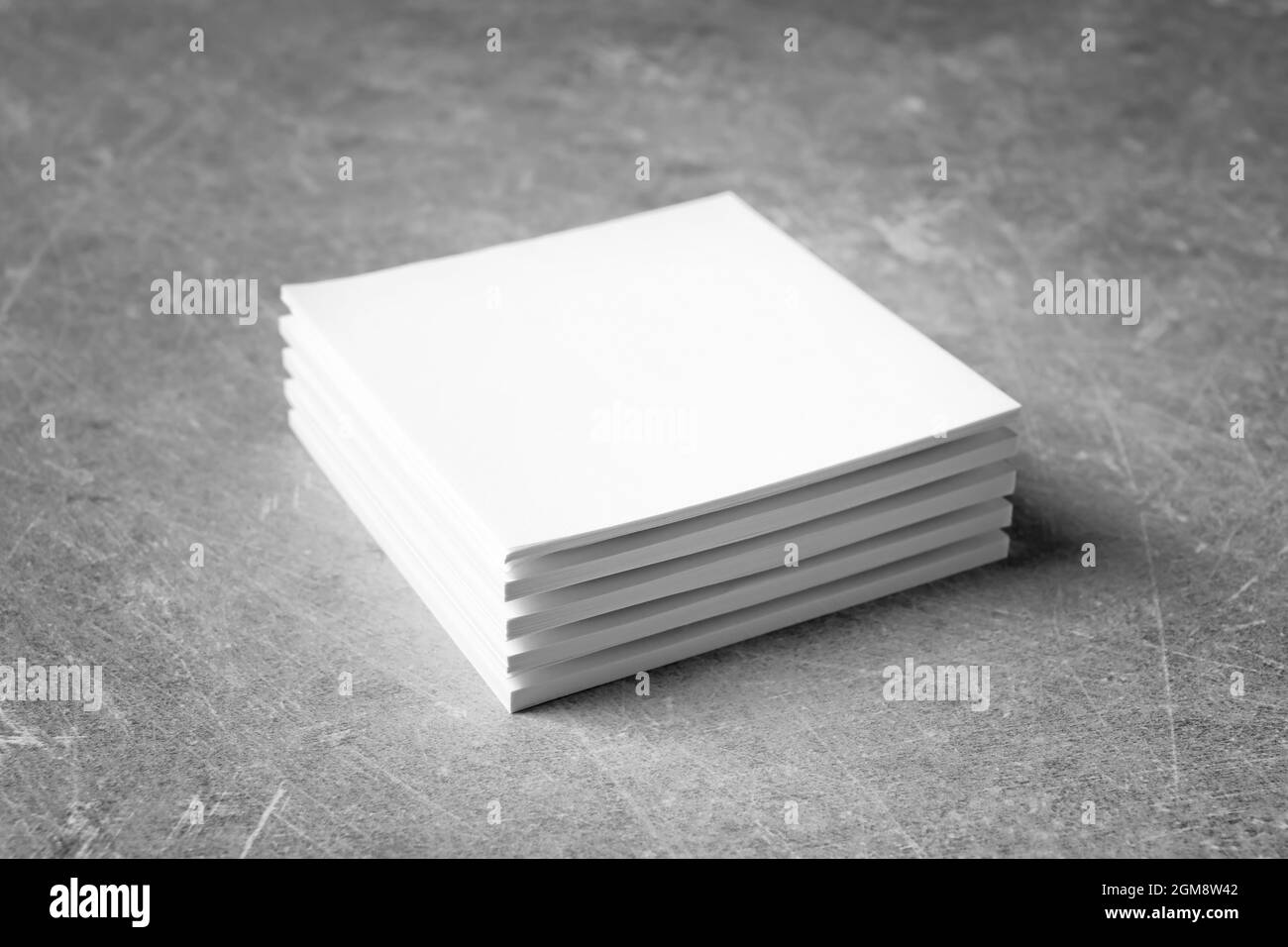 Blank sheets of paper on grey background. Mock up for design Stock ...