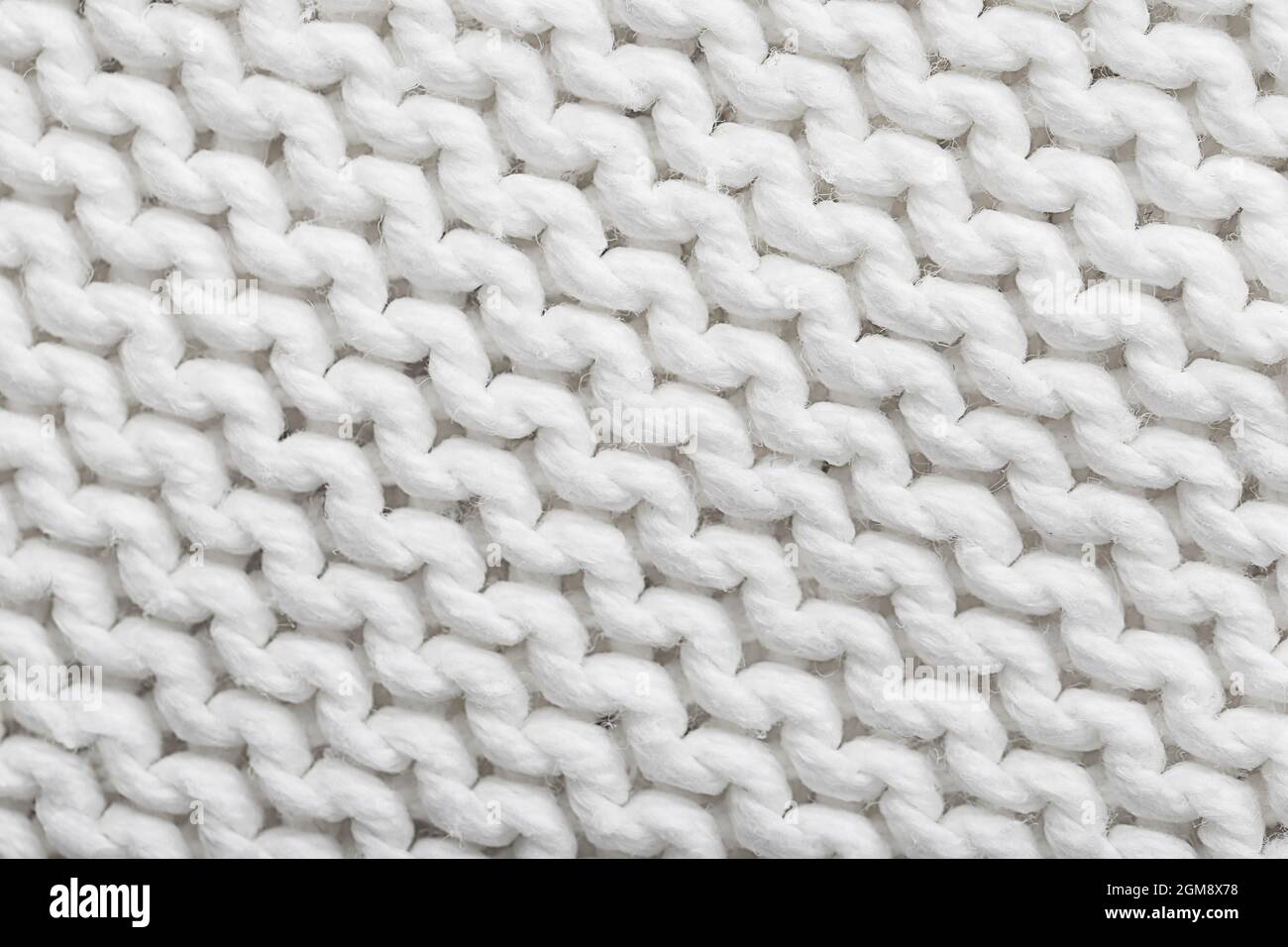 White knitted fabric texture as background, closeup Stock Photo - Alamy