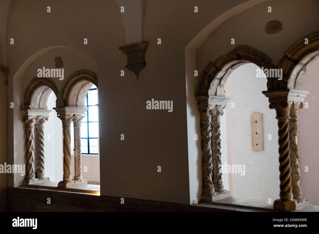 Twisted columns and arches at Montecassino Abbey in Italy Stock Photo ...