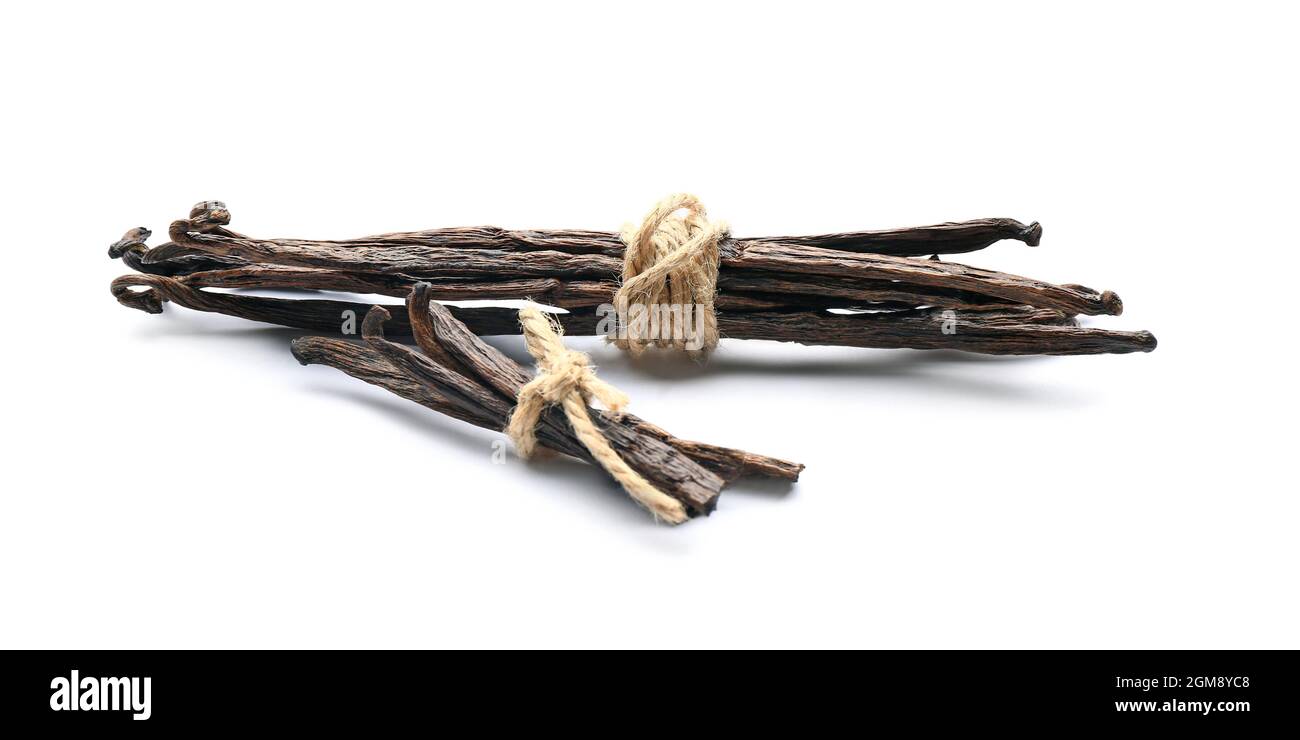 Vanilla sticks on white background Stock Photo - Alamy
