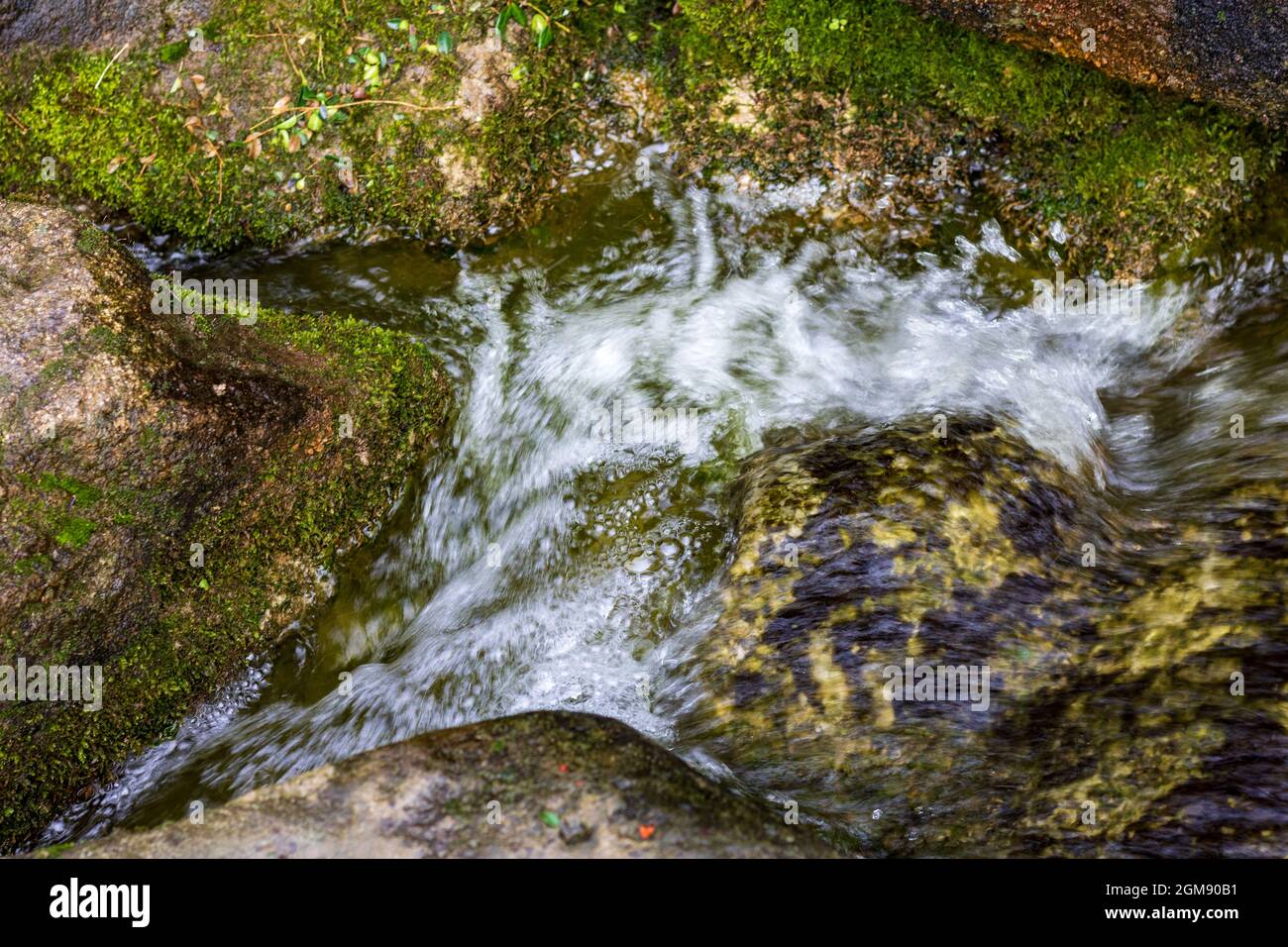 water flowing over rocks, top view Stock Photo - Alamy