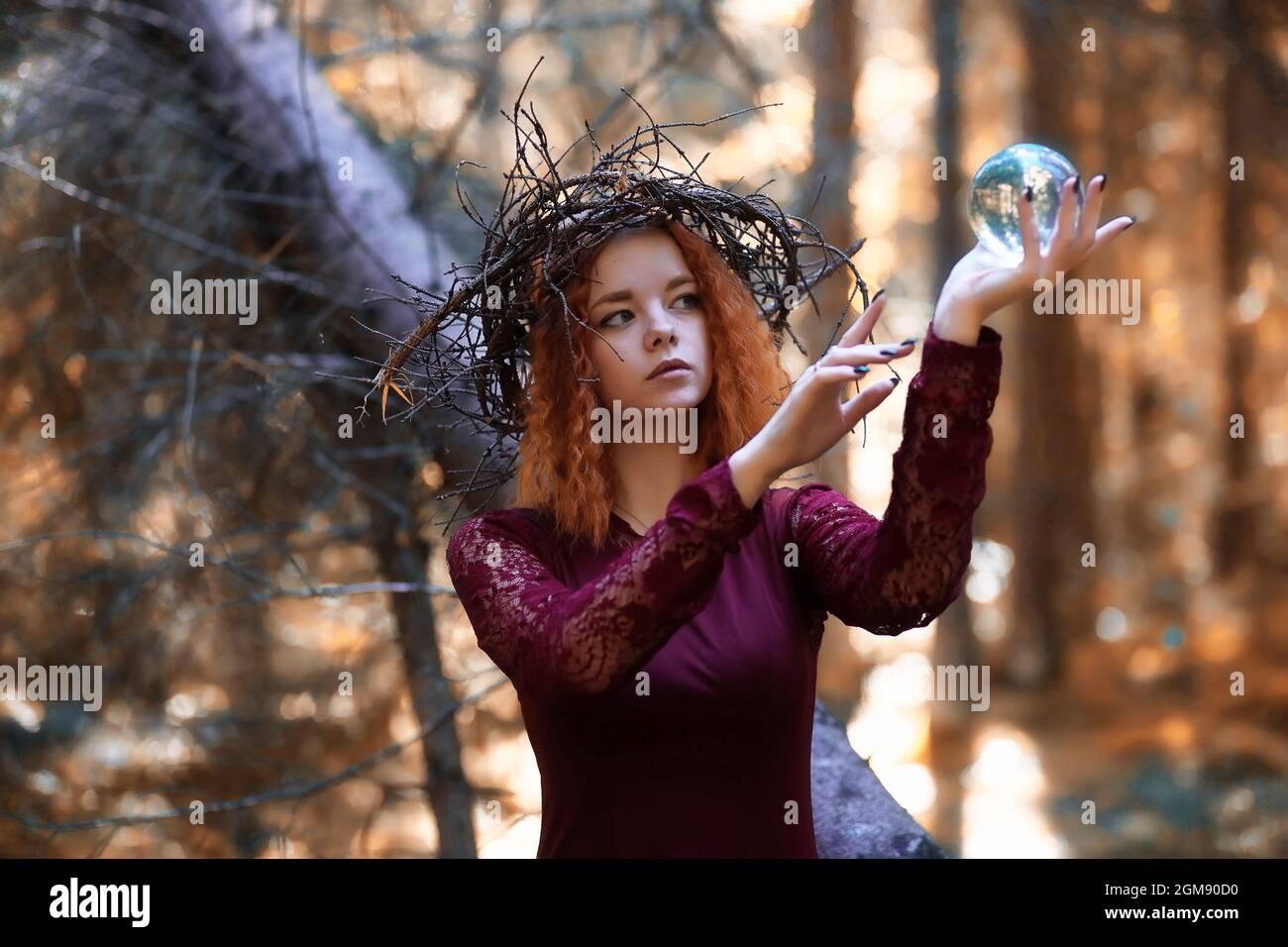 Fortune-teller conducts a ritual in the depths of the forest Stock ...