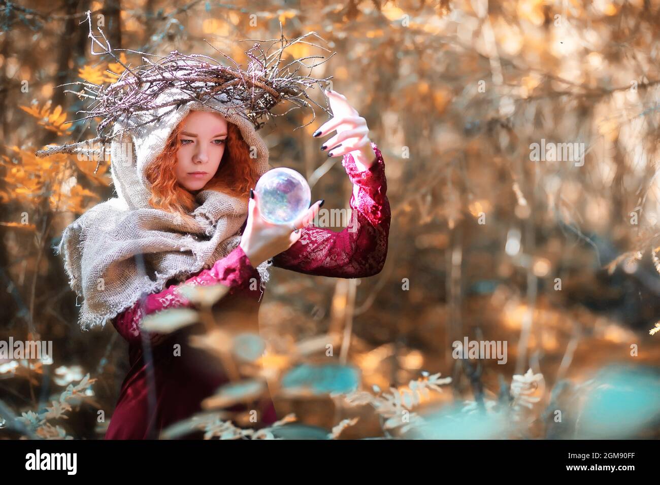 Fortune-teller conducts a ritual in the depths of the forest Stock ...