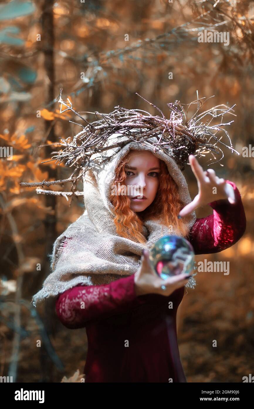Fortune-teller conducts a ritual in the depths of the forest Stock ...