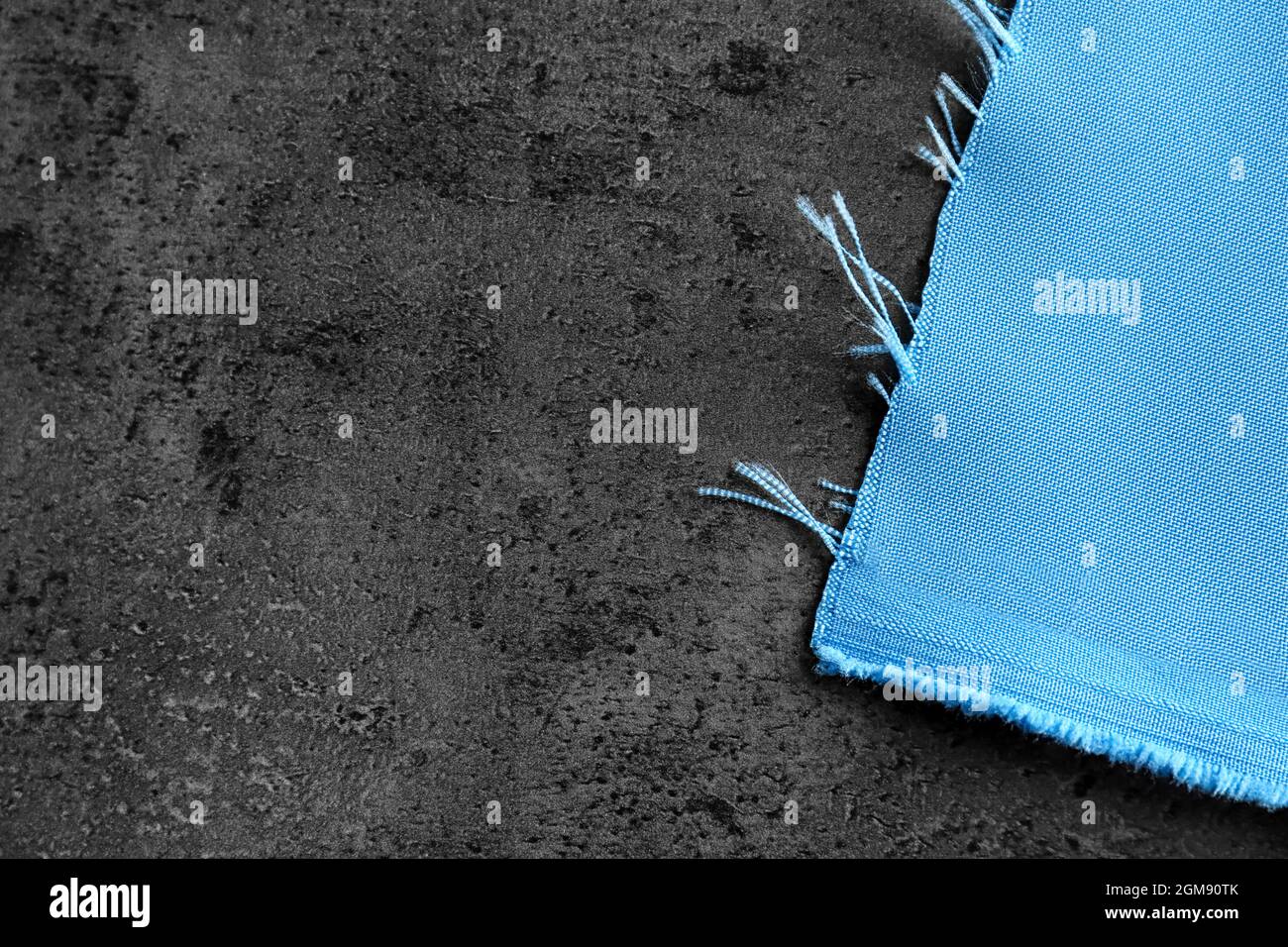 Blue textile on dark background. Fabric texture Stock Photo - Alamy