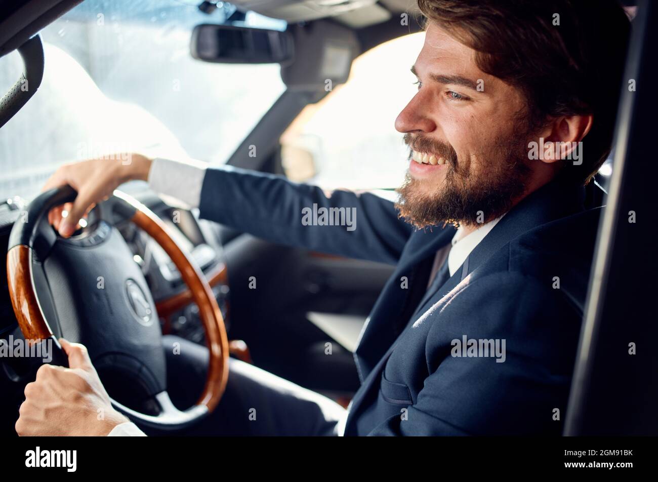businessmen Driving a car trip luxury lifestyle rich Stock Photo - Alamy