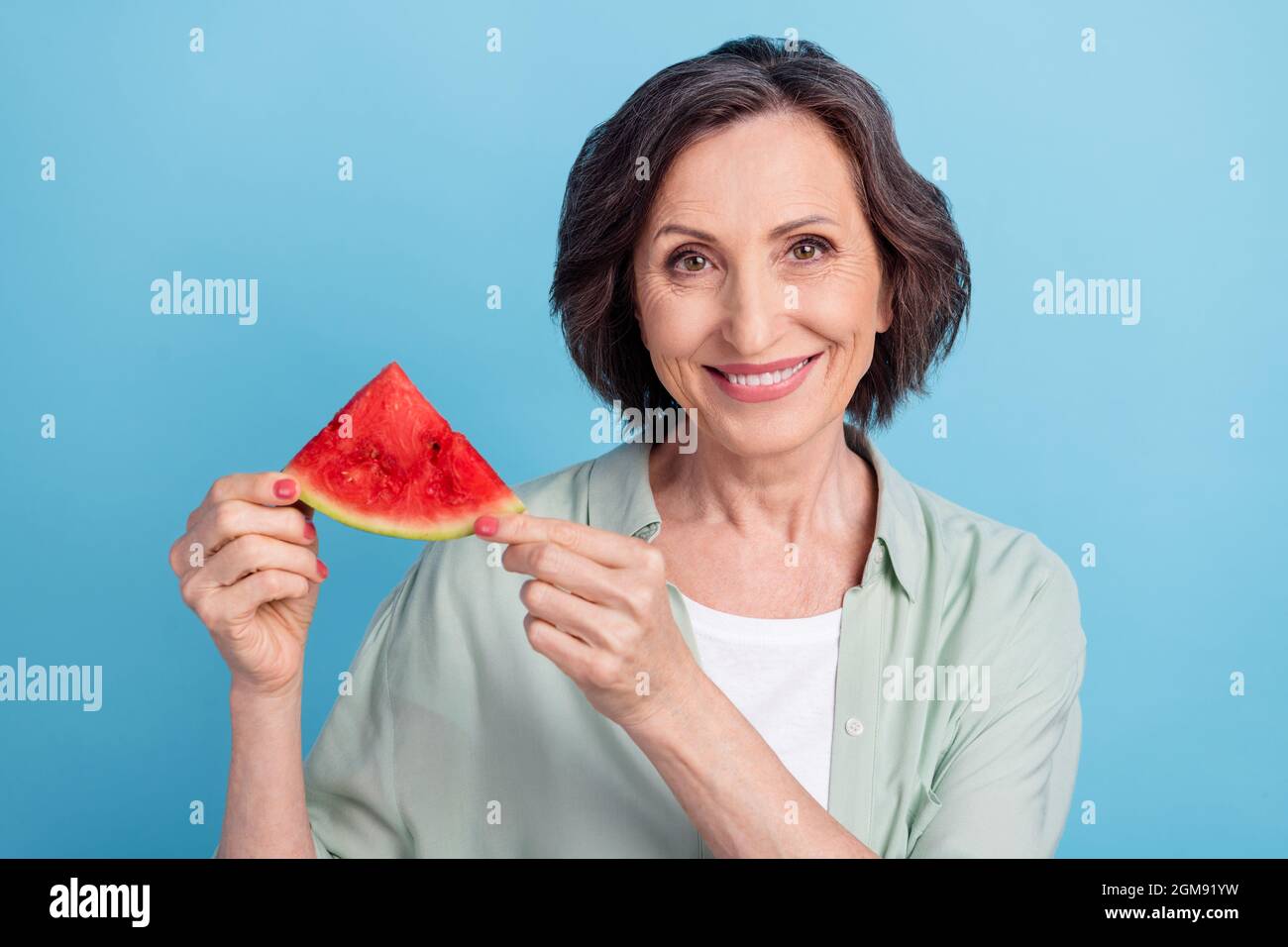 Photo portrait senior woman keeping sweet watermelon smiling isolated ...