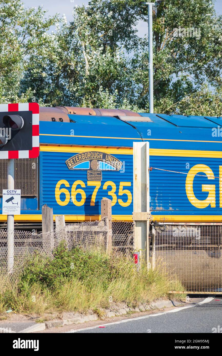 GB Railfreight Class 66 Heavy Freight Locomotive Crossing A228 at Grain ...