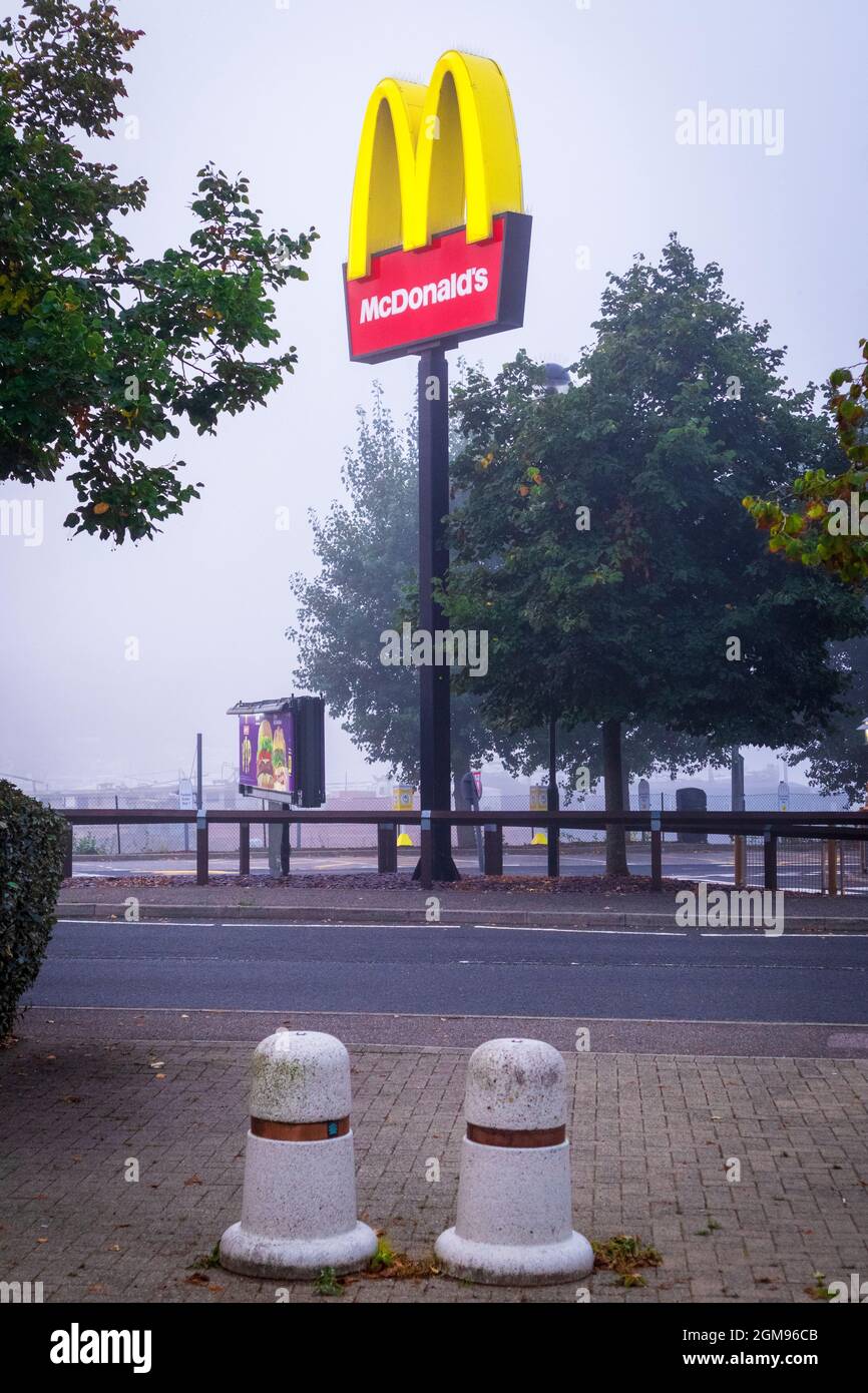 The Iconic Double Arch 'M' of a McDonalds Franchise Outlet on a Misty ...