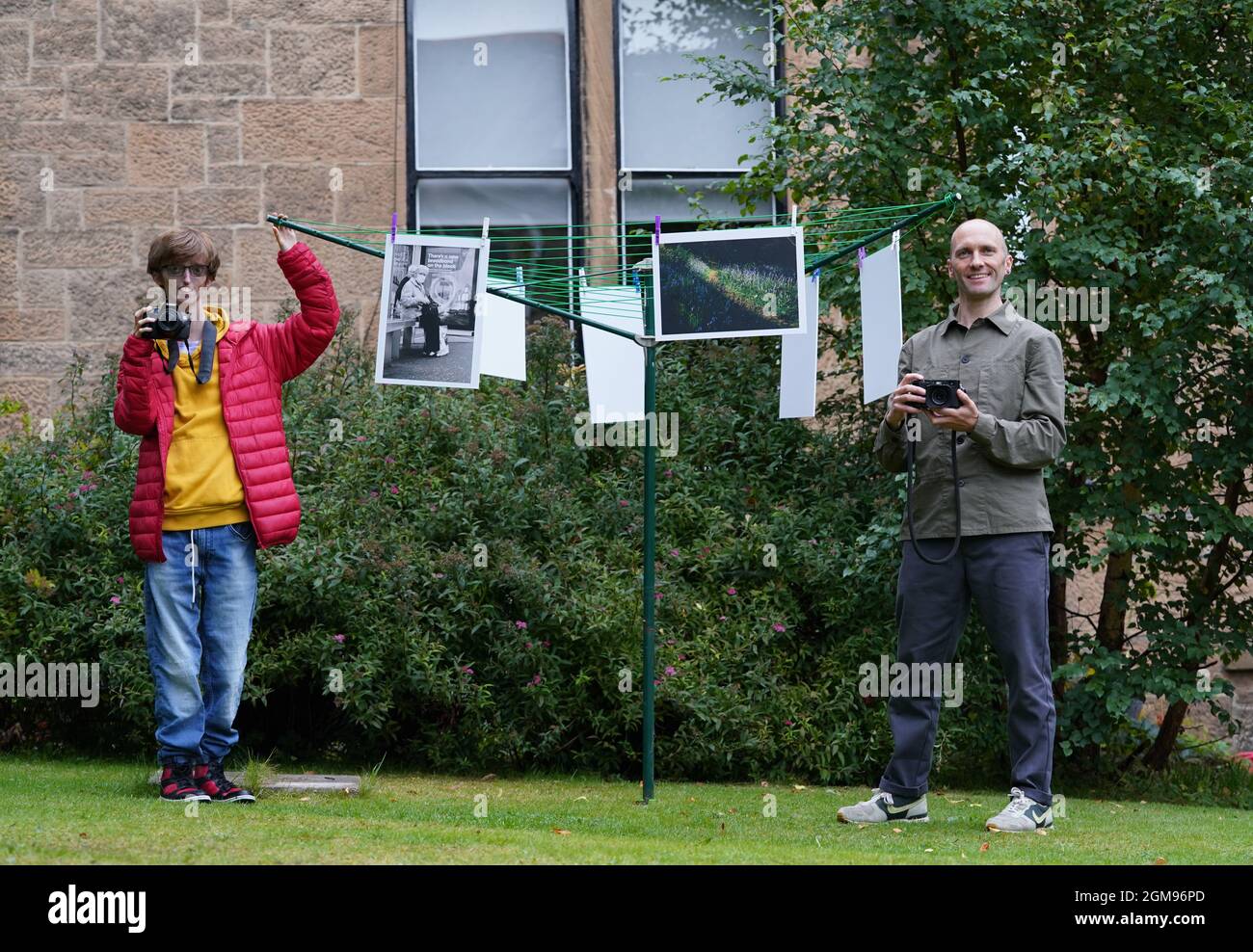 Photographers Brian Hartley and Dylan Lombard(L) at their exhibition of ...