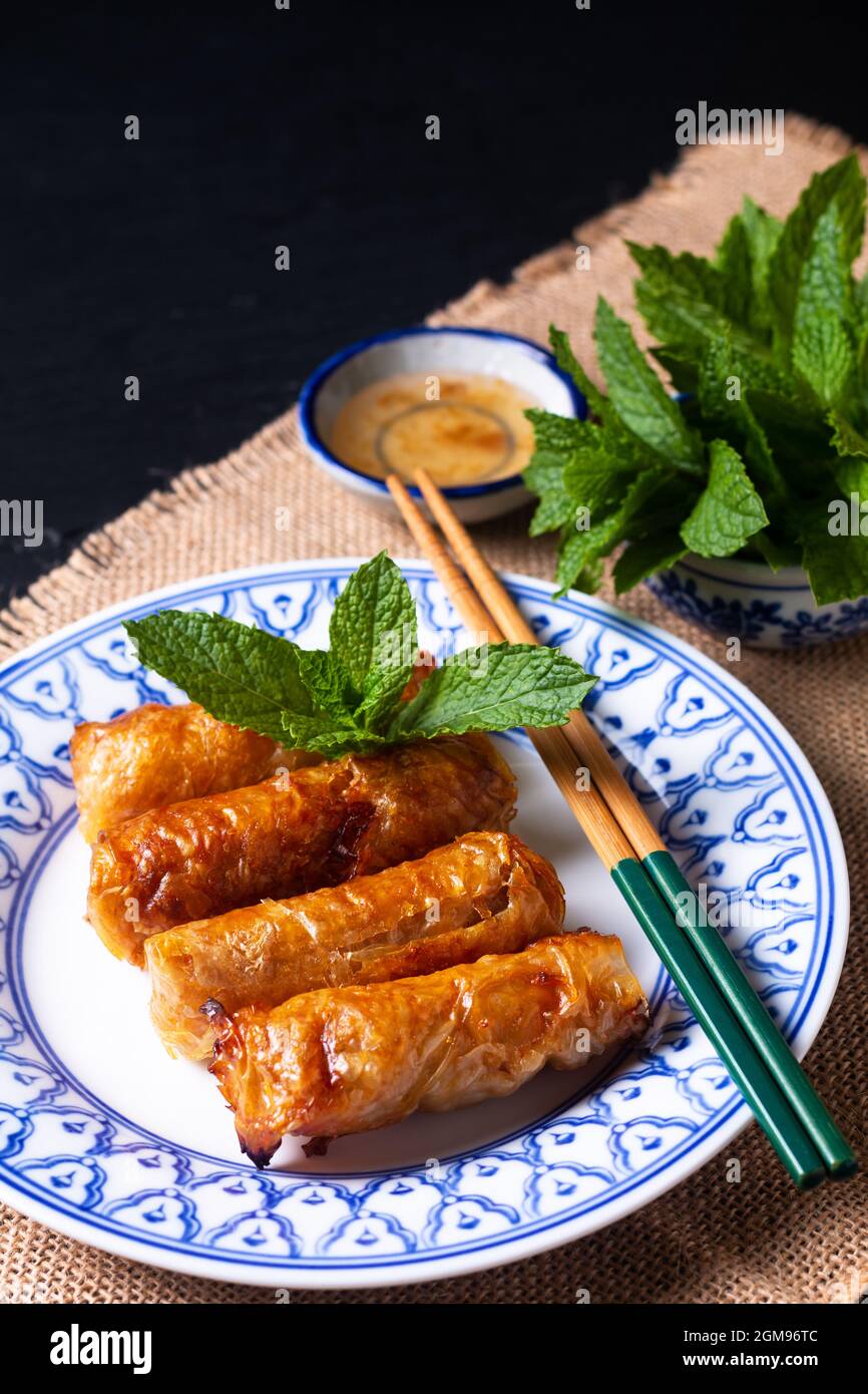 Food concept Vietnamese fried Rice paper spring rolls with mints on ...