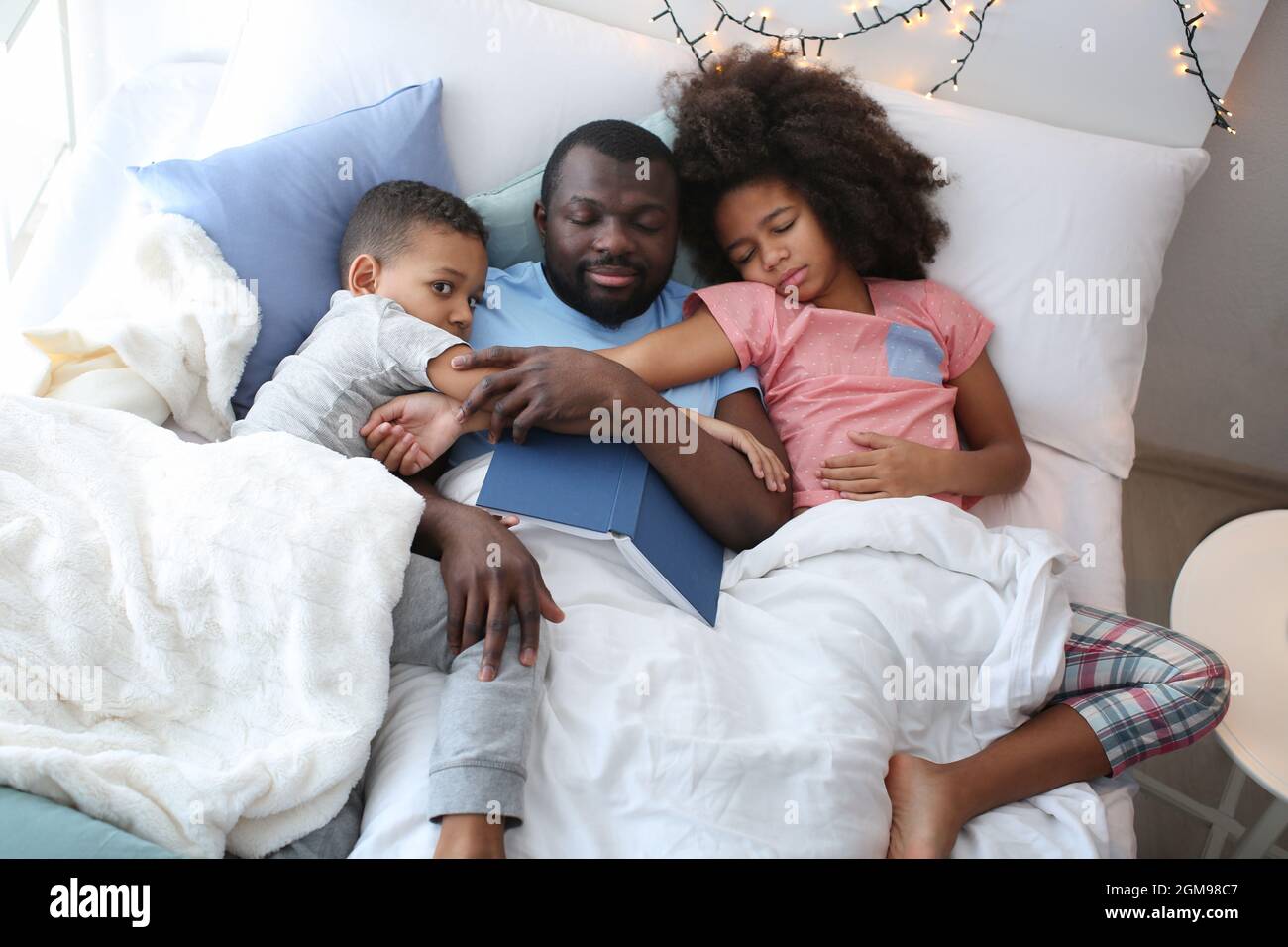 African american father son sleep hi-res stock photography and images ...