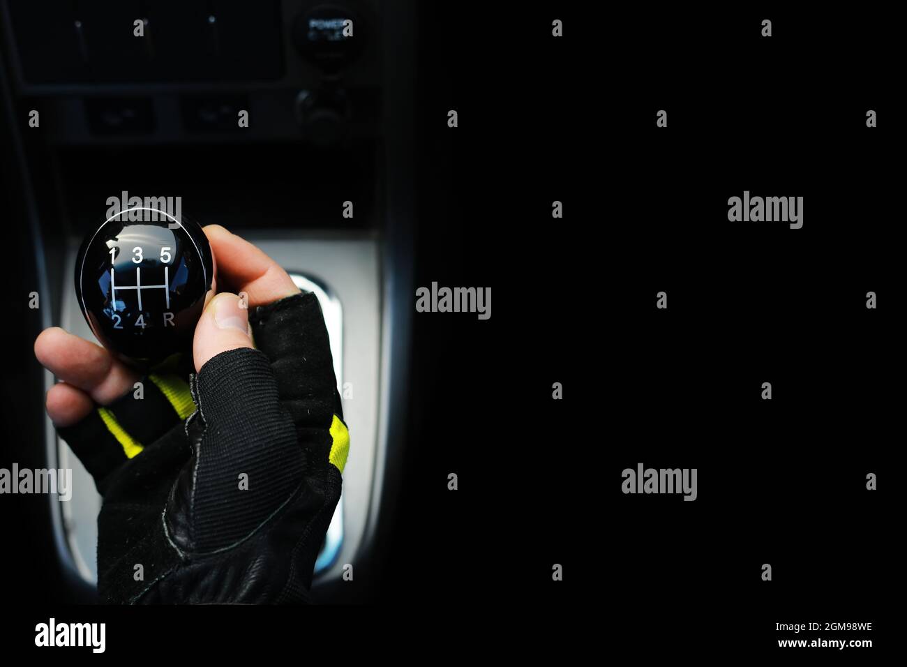 Gear lever. Manual Transmission. Hand on the gear shift in the car ...